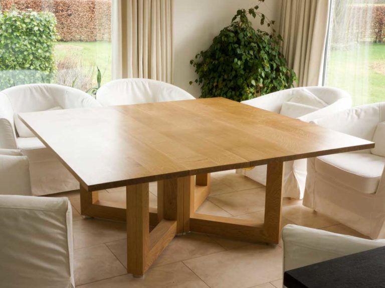 Square extending oak table with central column - Dovetailors